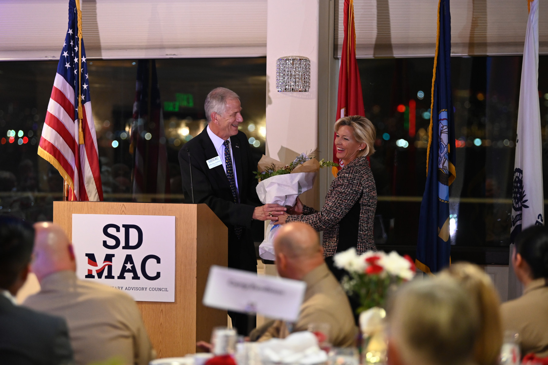 Amy Forsythe is honored at an event for the San Diego Military Advisory ...