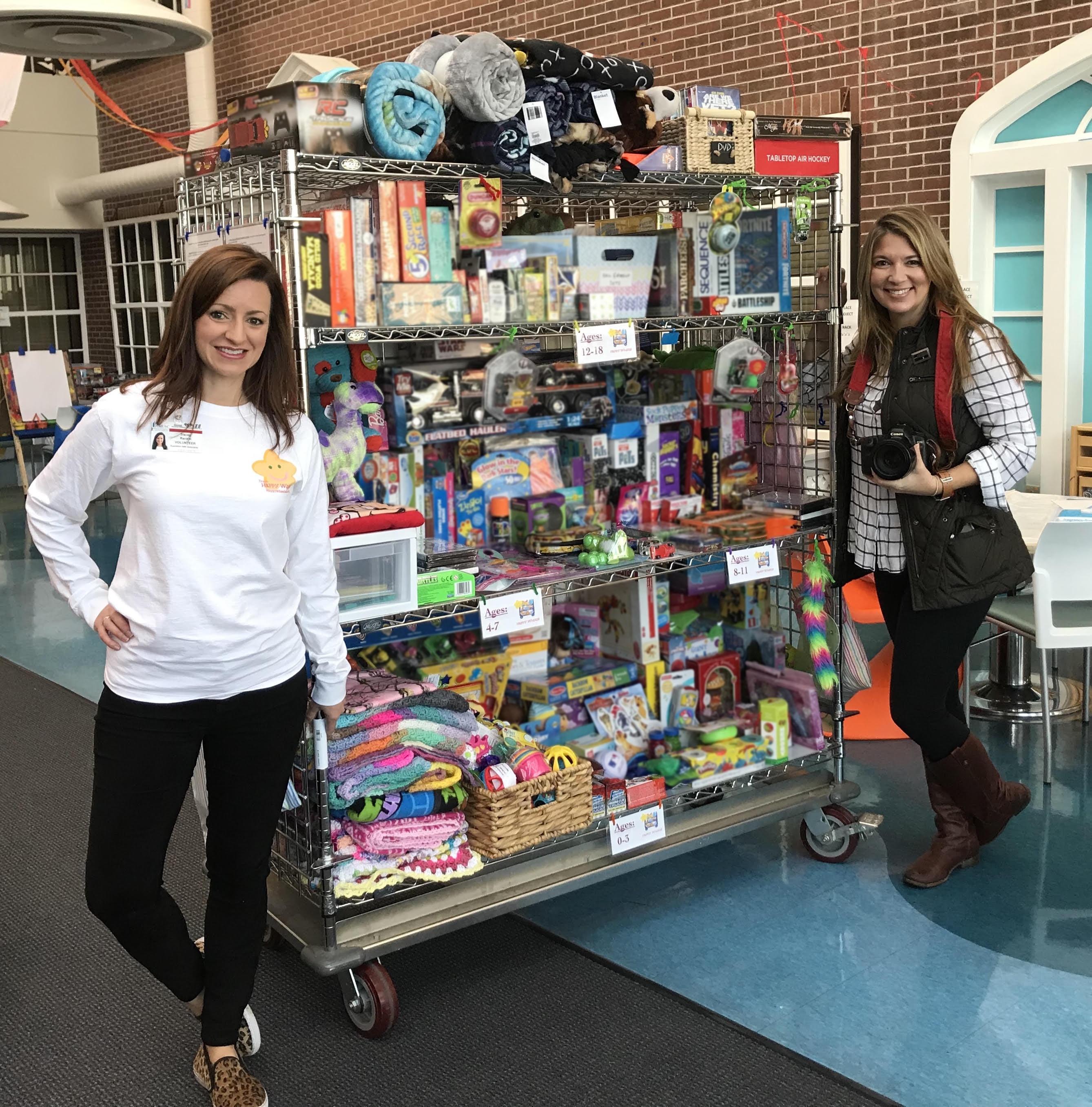 Neighborhood Asst Winner Carts Joy to Hospitalized Children