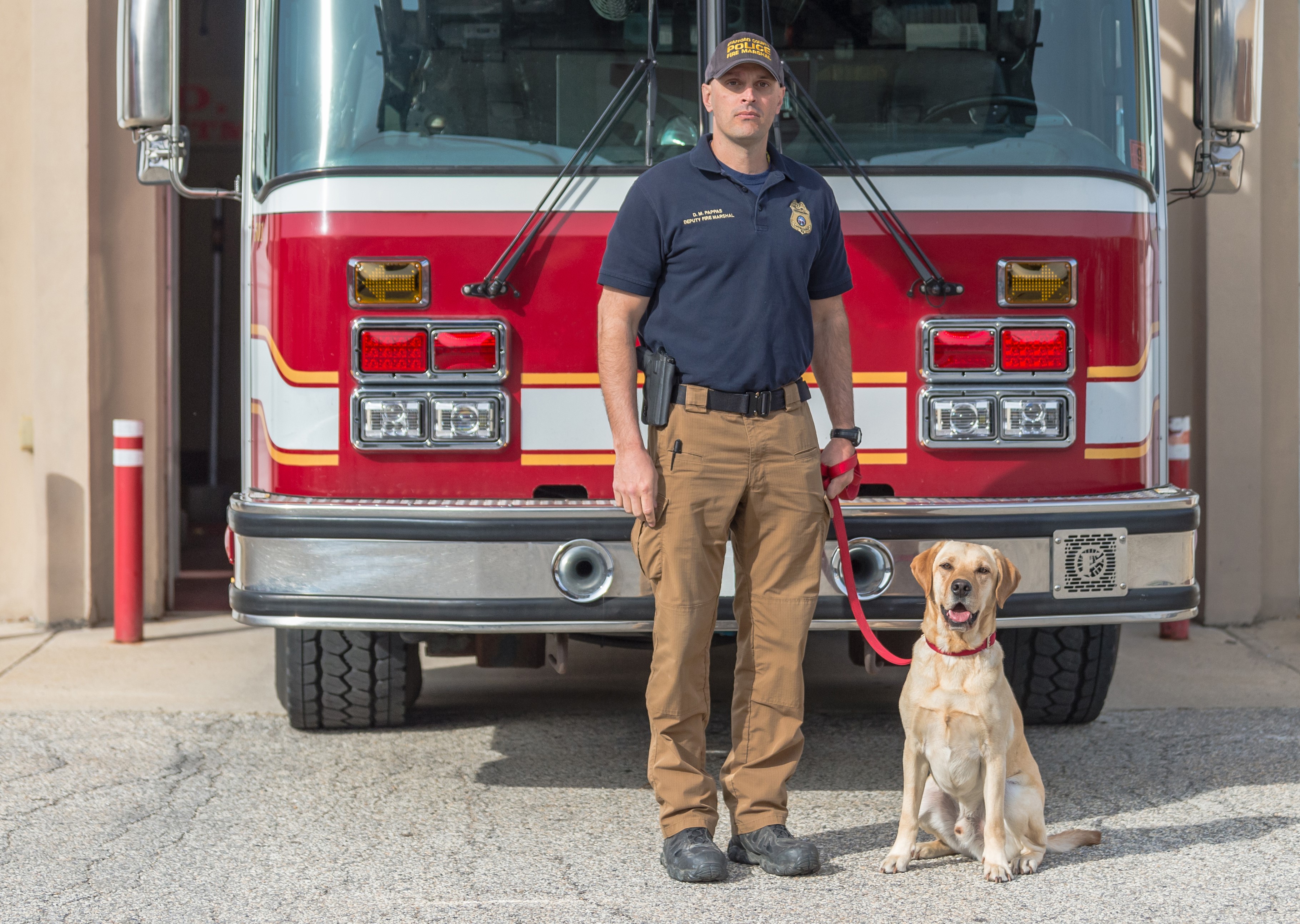 Crime-fighting canines graduate from the State Farm Arson Dog Class #54