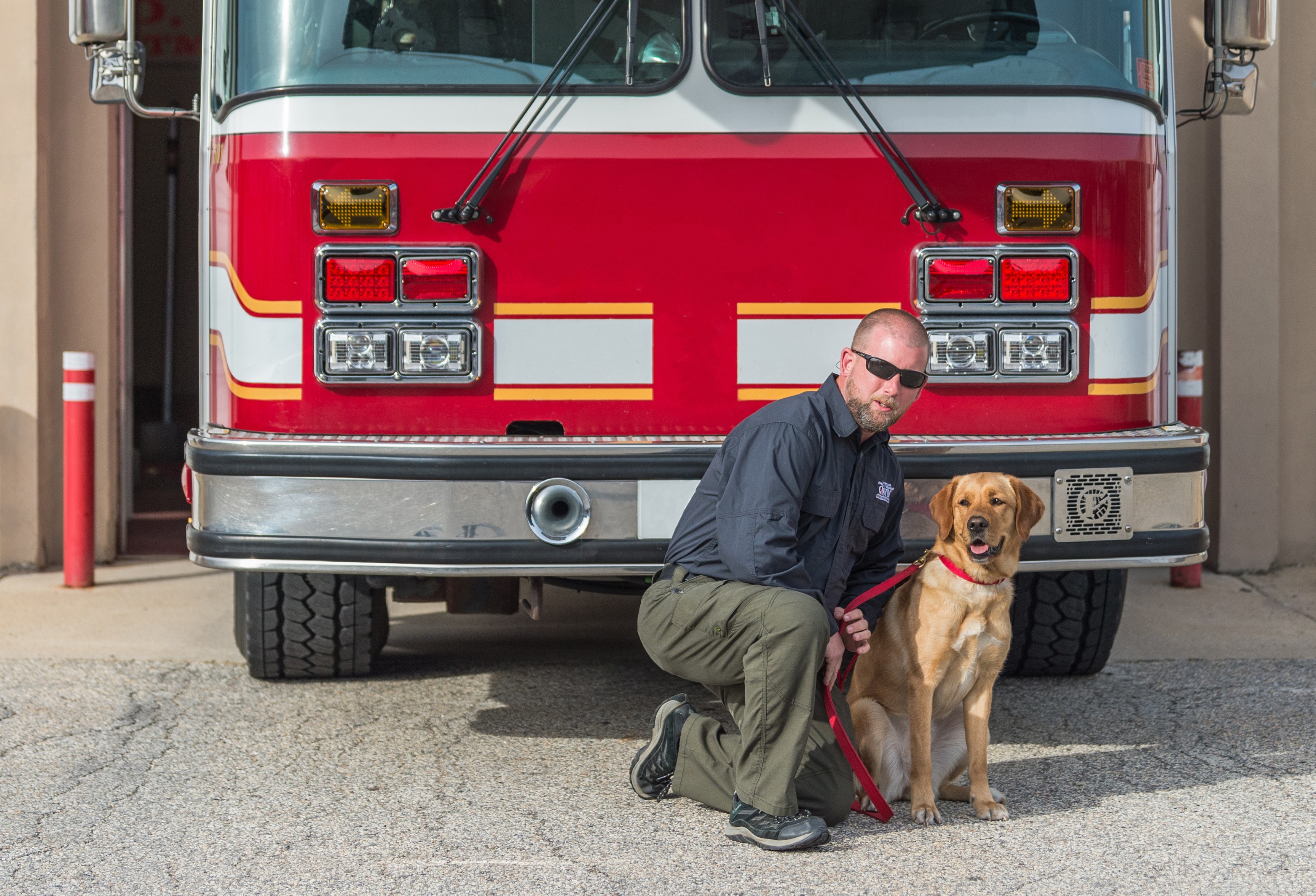 Crime-fighting canines graduate from the State Farm Arson Dog Class #54