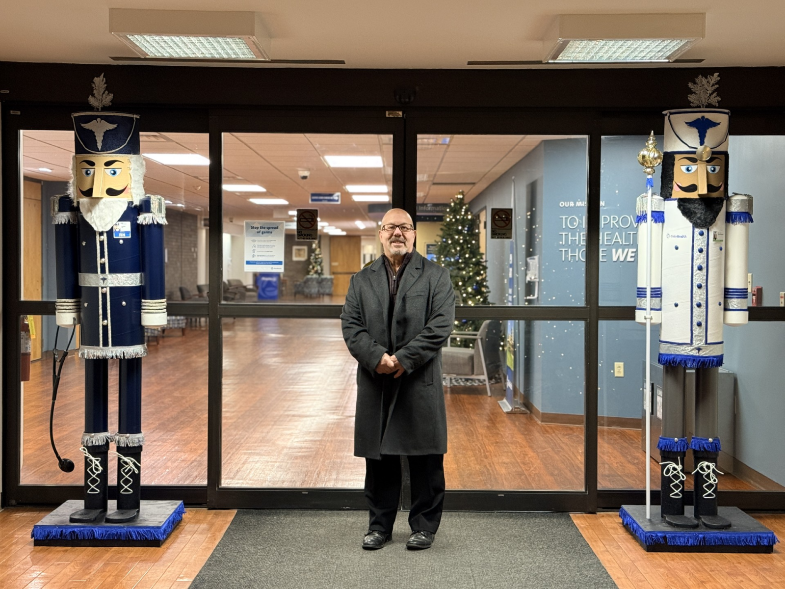 Local 9-1-1 Dispatcher Creates 7-Foot Nutcrackers to Honor Hospital Staff