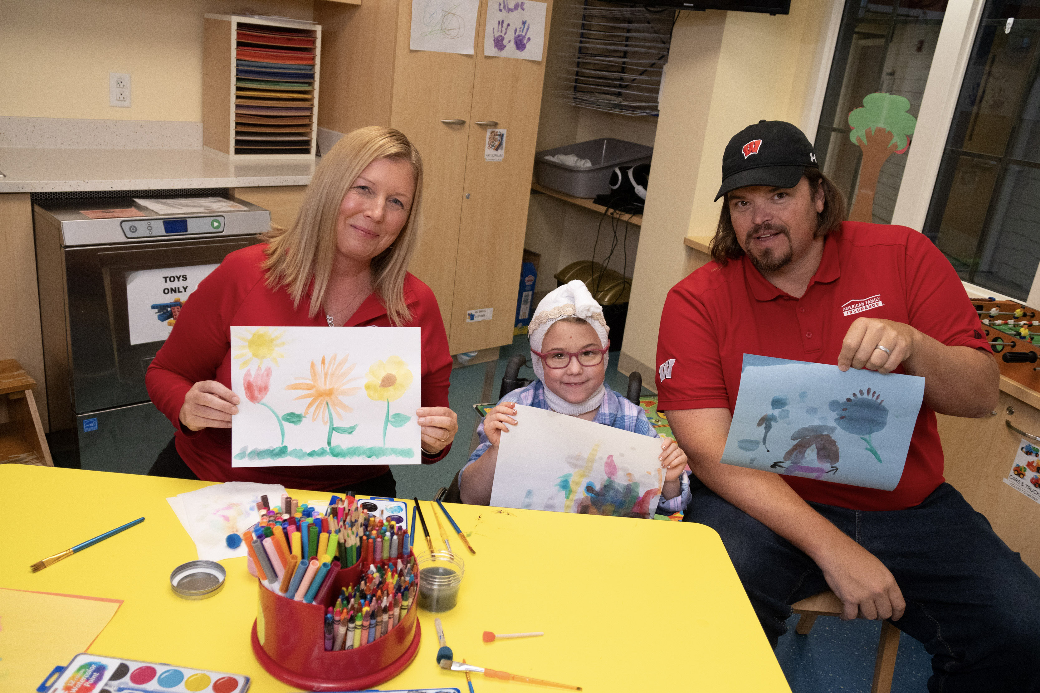 Mark and Sarah Tauscher and American Family Insurance team up again to ...