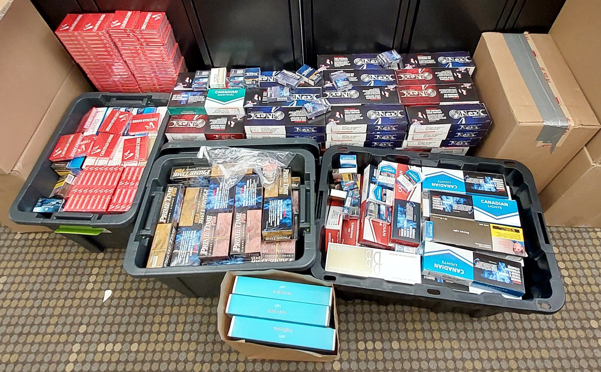Five charged in illegal selling of contraband cigarettes