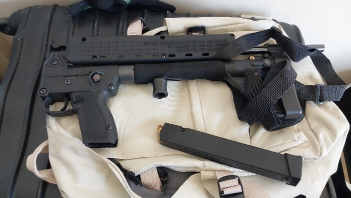 Two men charged, weapons and drugs seized in police investigation