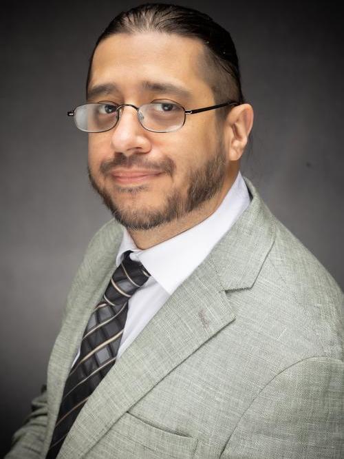 Dr. Robert Garcia, former activist, brings research home