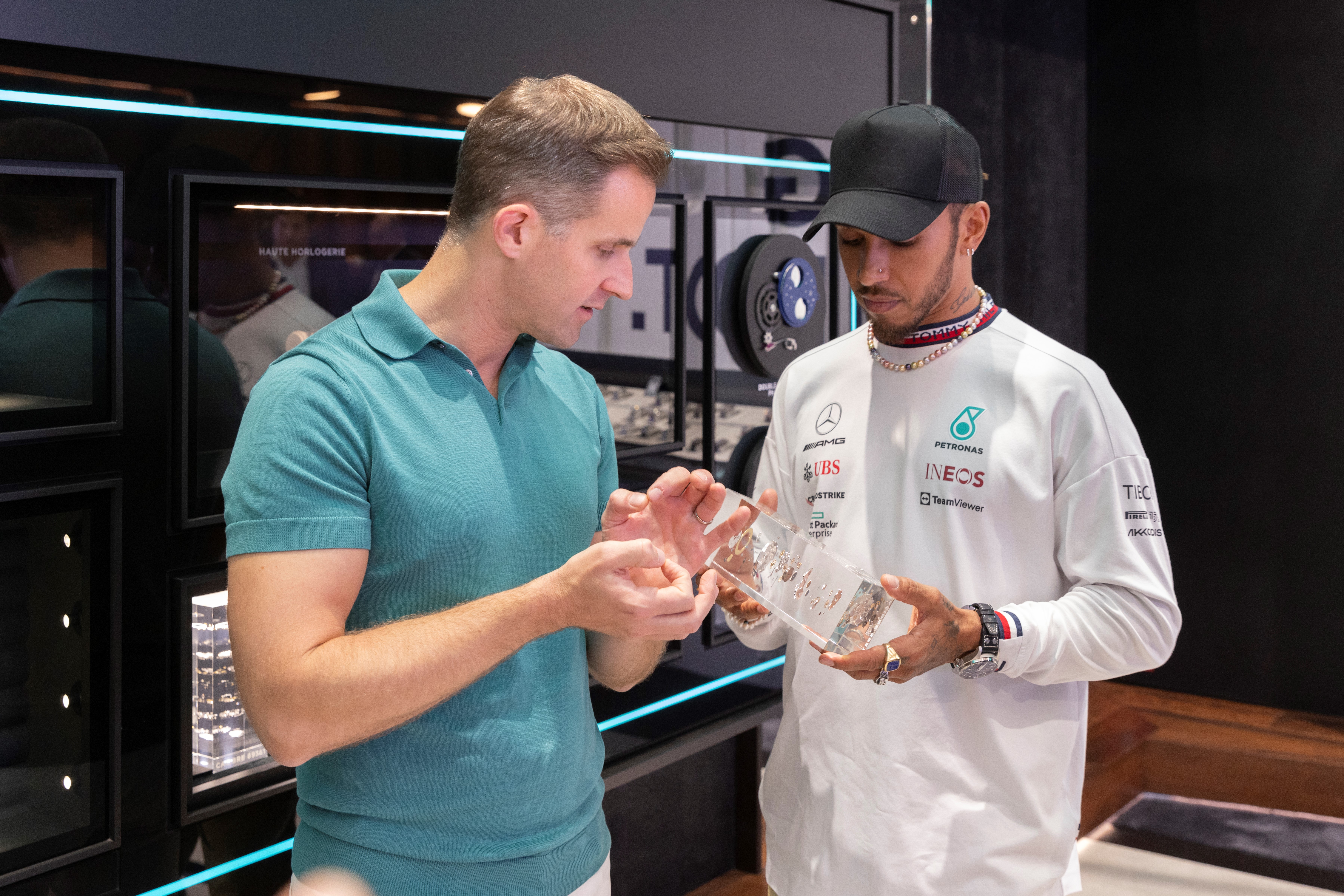 MERCEDES F1™ DRIVER LEWIS HAMILTON MAKES A PIT STOP AT THE IWC FLAGSHIP ...