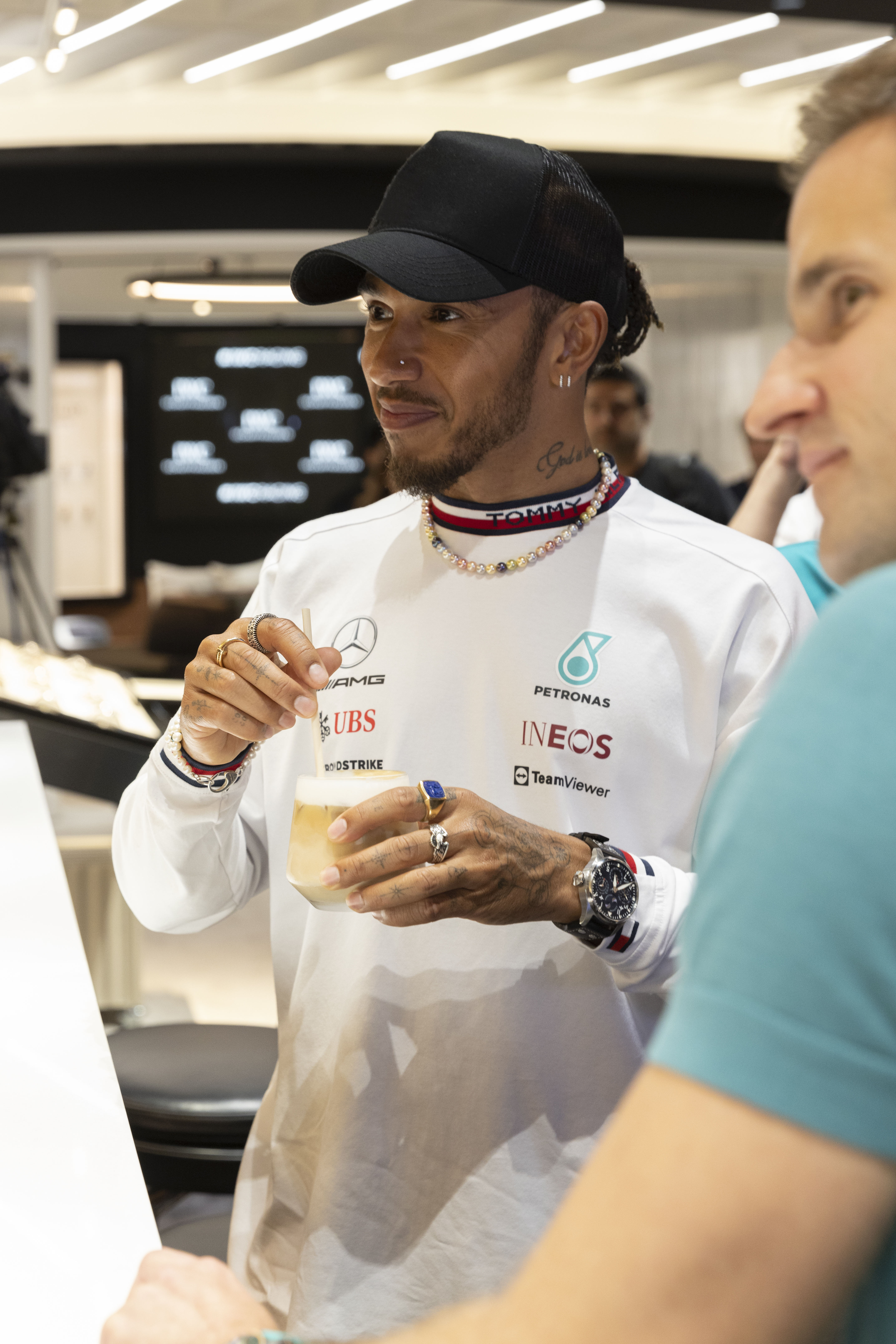 MERCEDES F1™ DRIVER LEWIS HAMILTON MAKES A PIT STOP AT THE IWC FLAGSHIP ...