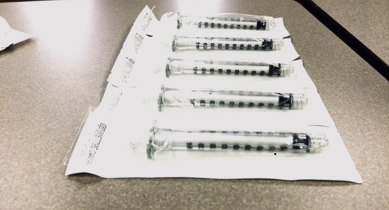 Syringes are prepared for the vaccines
