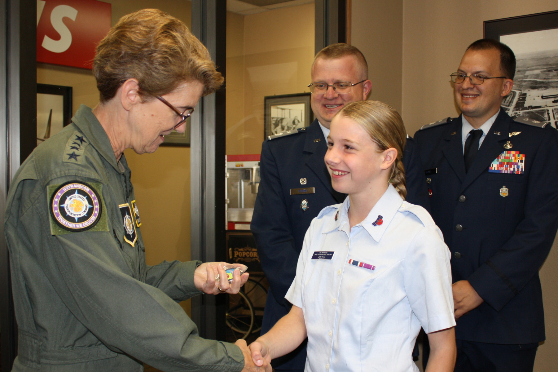 Wyoming Cadet Presents Challenge Coin to Gen. Van Ovost