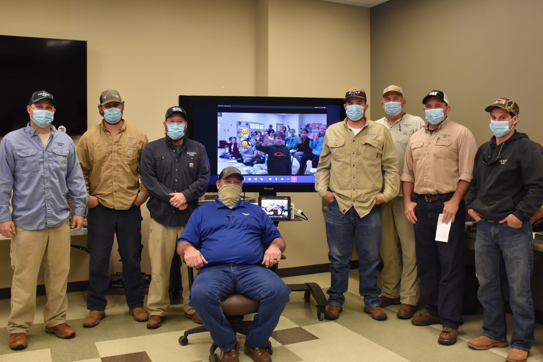 Local Fourth Grade Class Reads to Jackson EMC Linemen