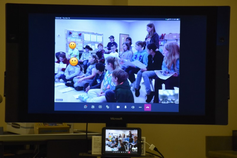 Local Fourth Grade Class Reads to Jackson EMC Linemen