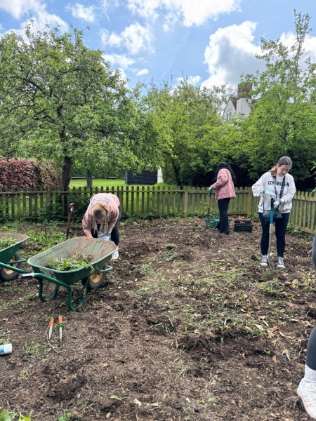 Ground force! Staff help spruce up local activity centre