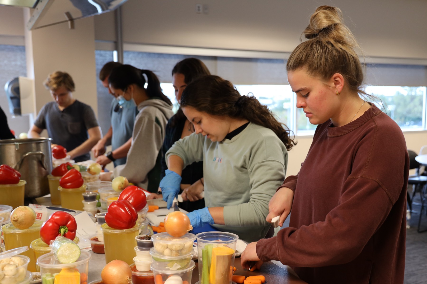 Students working on vegetable soup