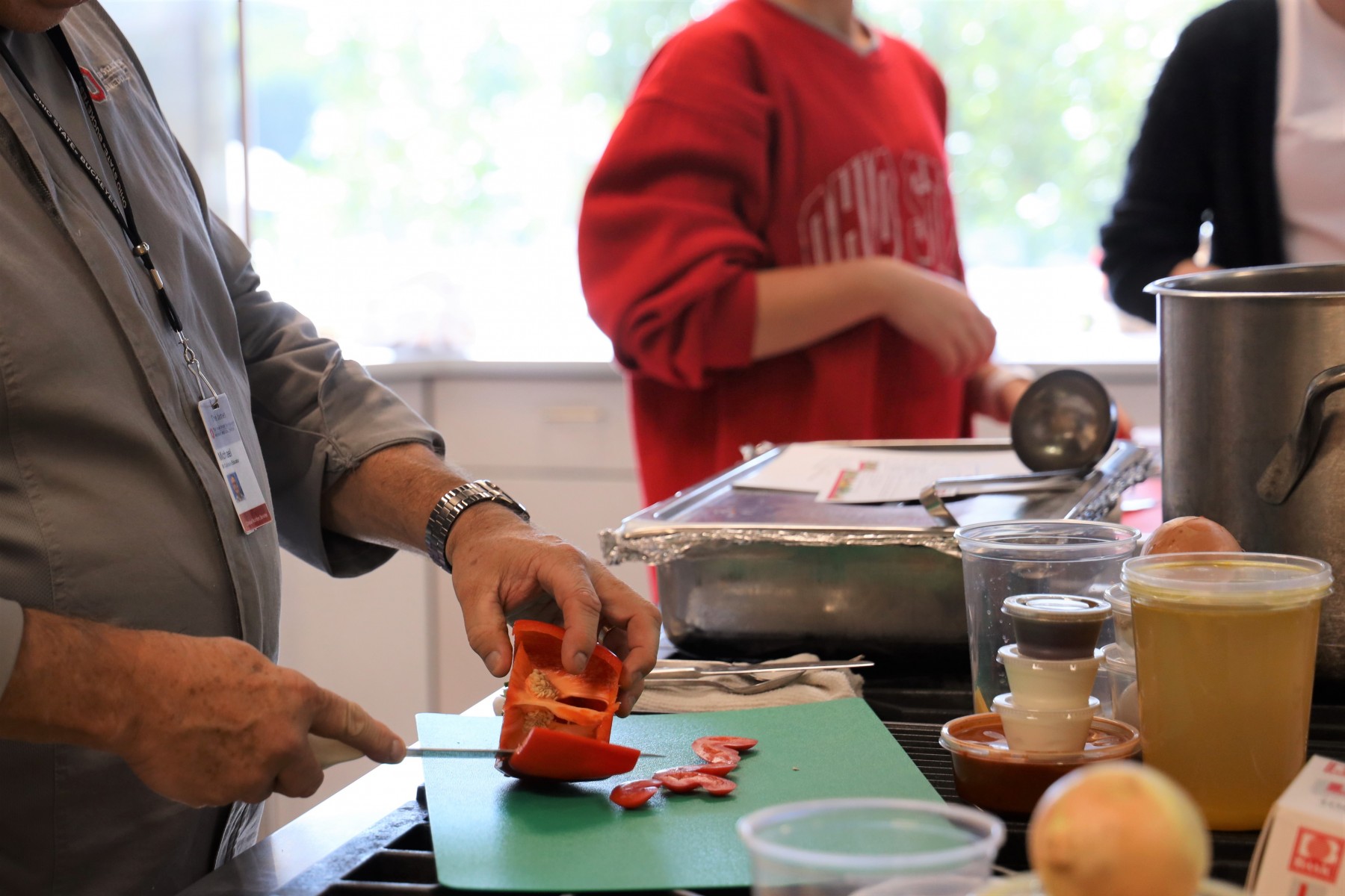 Michael Carnahan demonstrates cutting a bell pepper