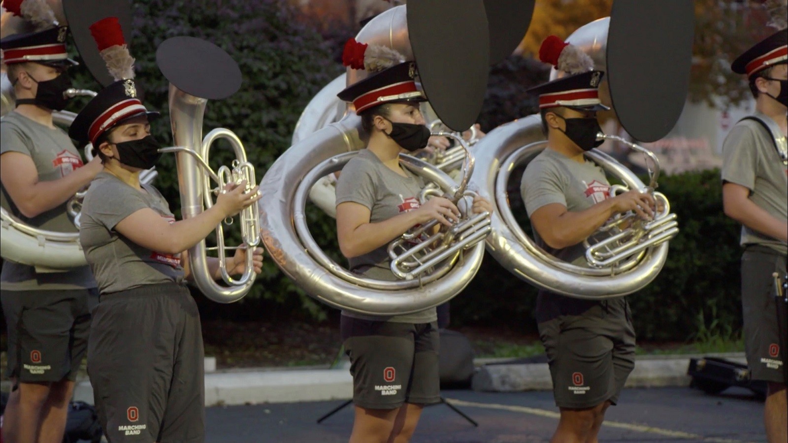 Marching band provides some pep to students in quarantine housing