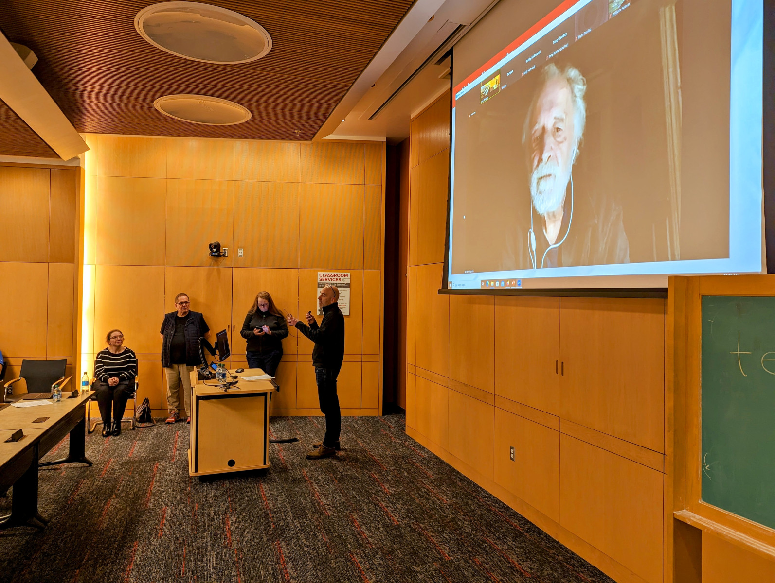 Michael Poirier, chair of physics, speaks at the Department of Physics ...