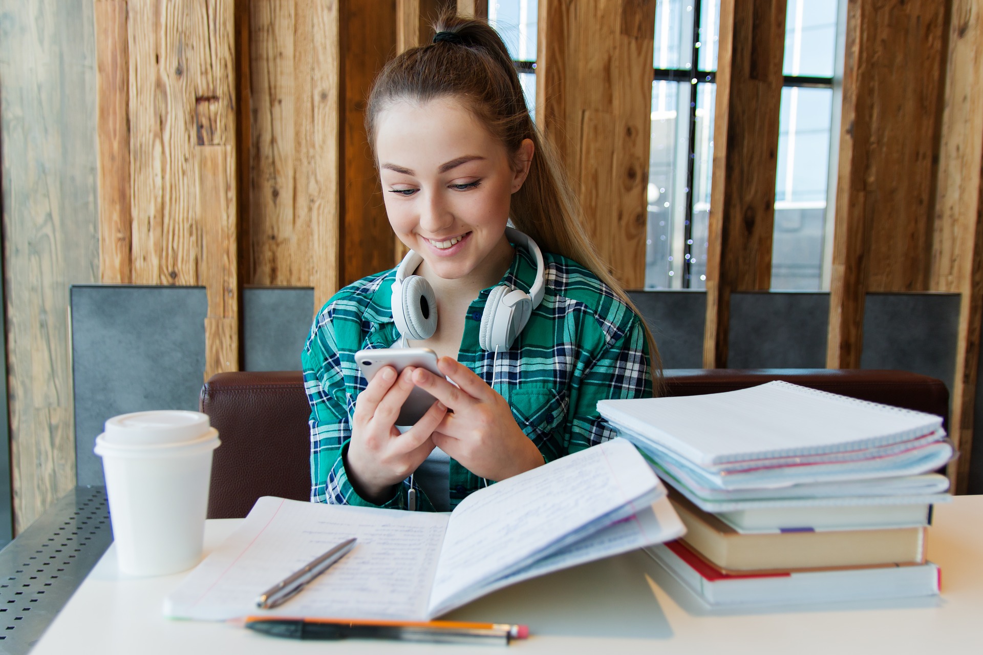 For teens, multitasking makes them feel better – and worse