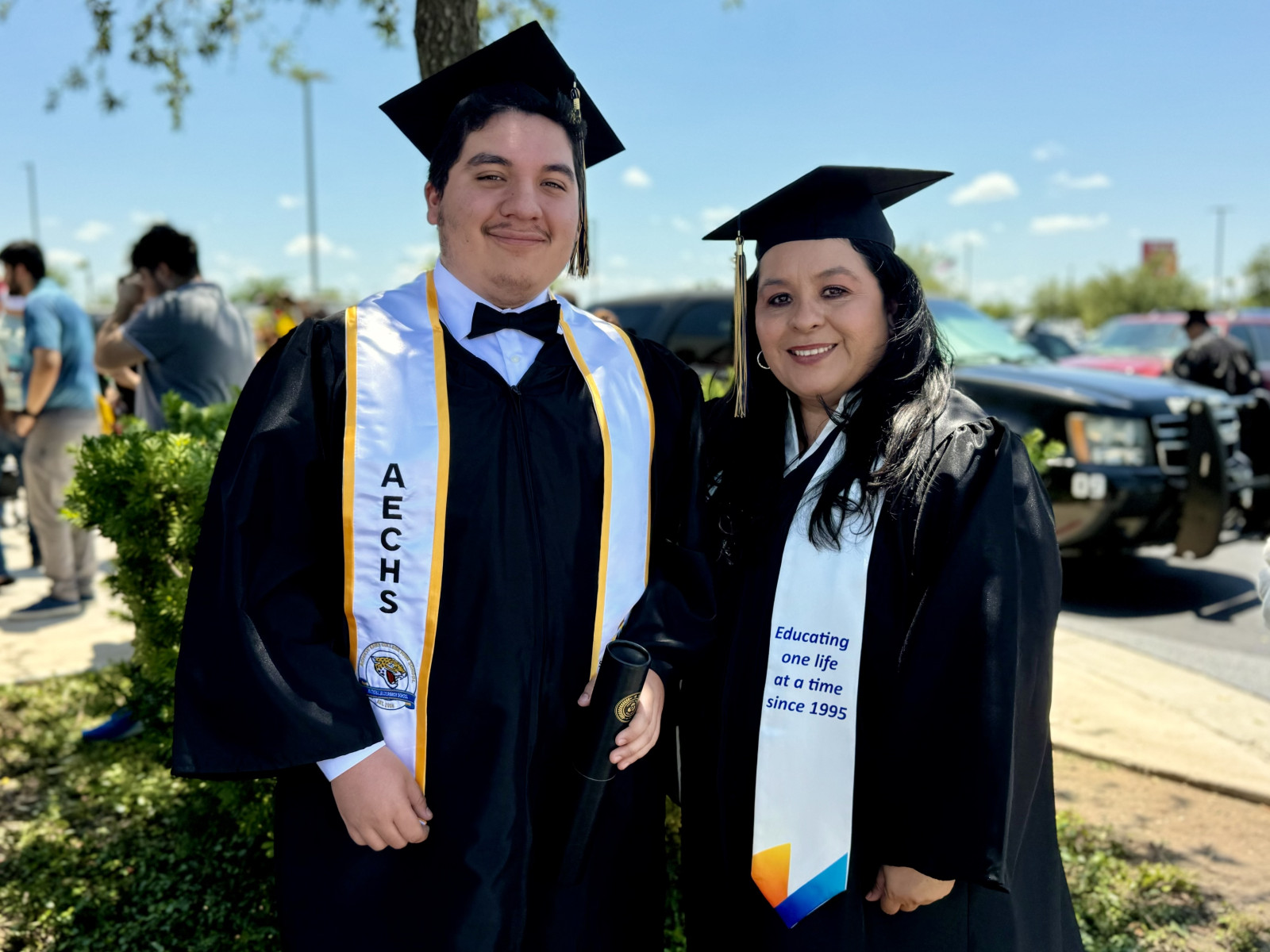 A journey of faith, family and determination: Mother and son earn ...