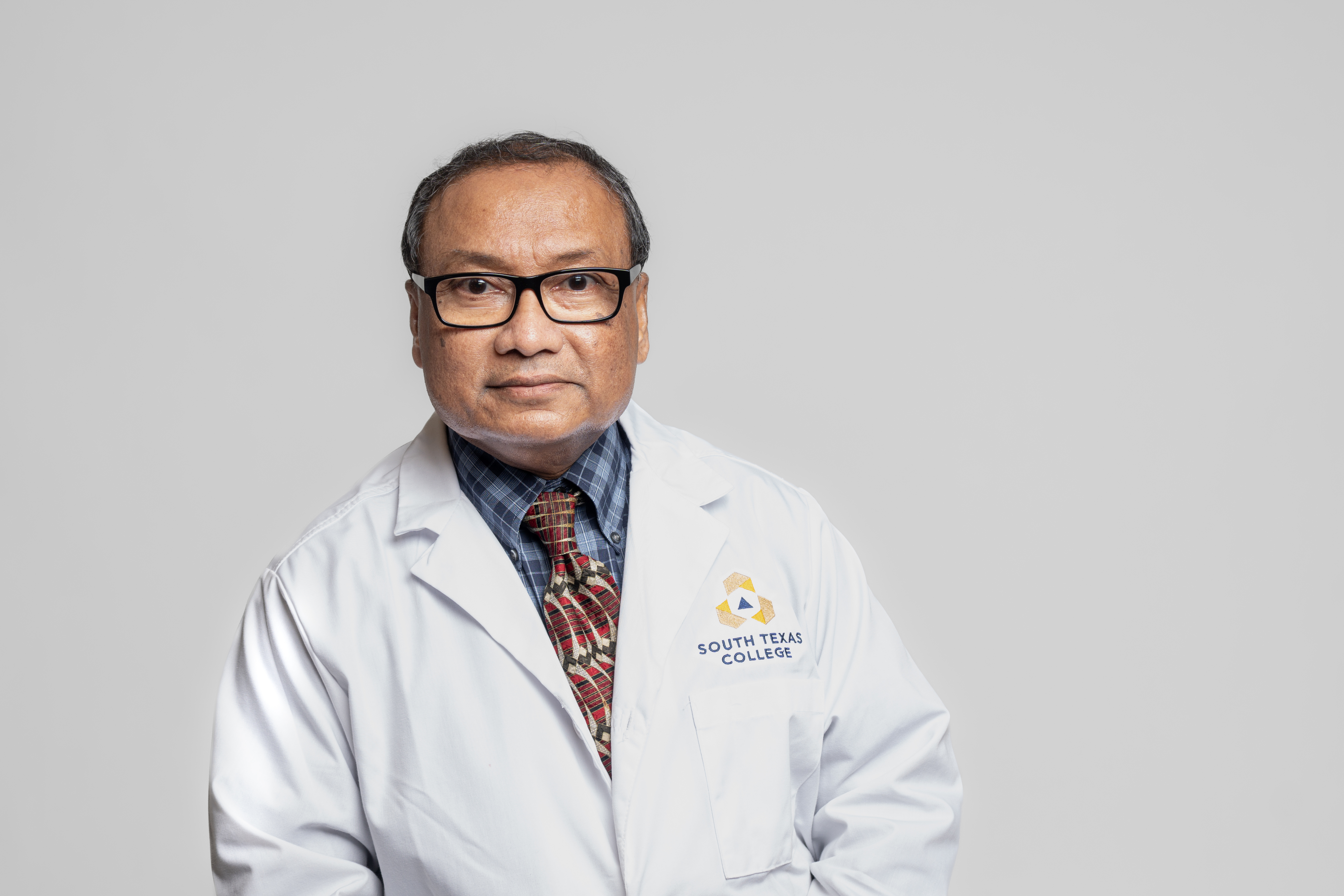 Celebrating academic excellence, Biology professor receives faculty ...
