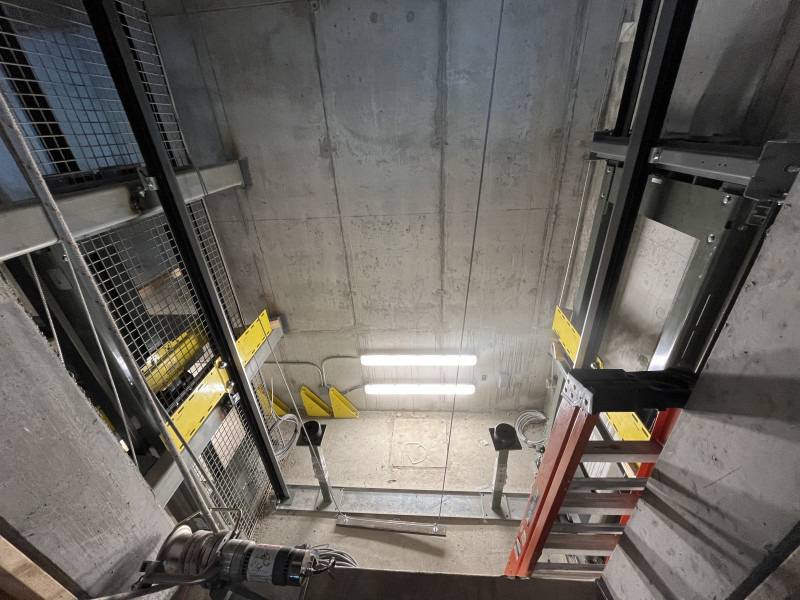 Escalators, elevators being installed in Red Express Curbsides building