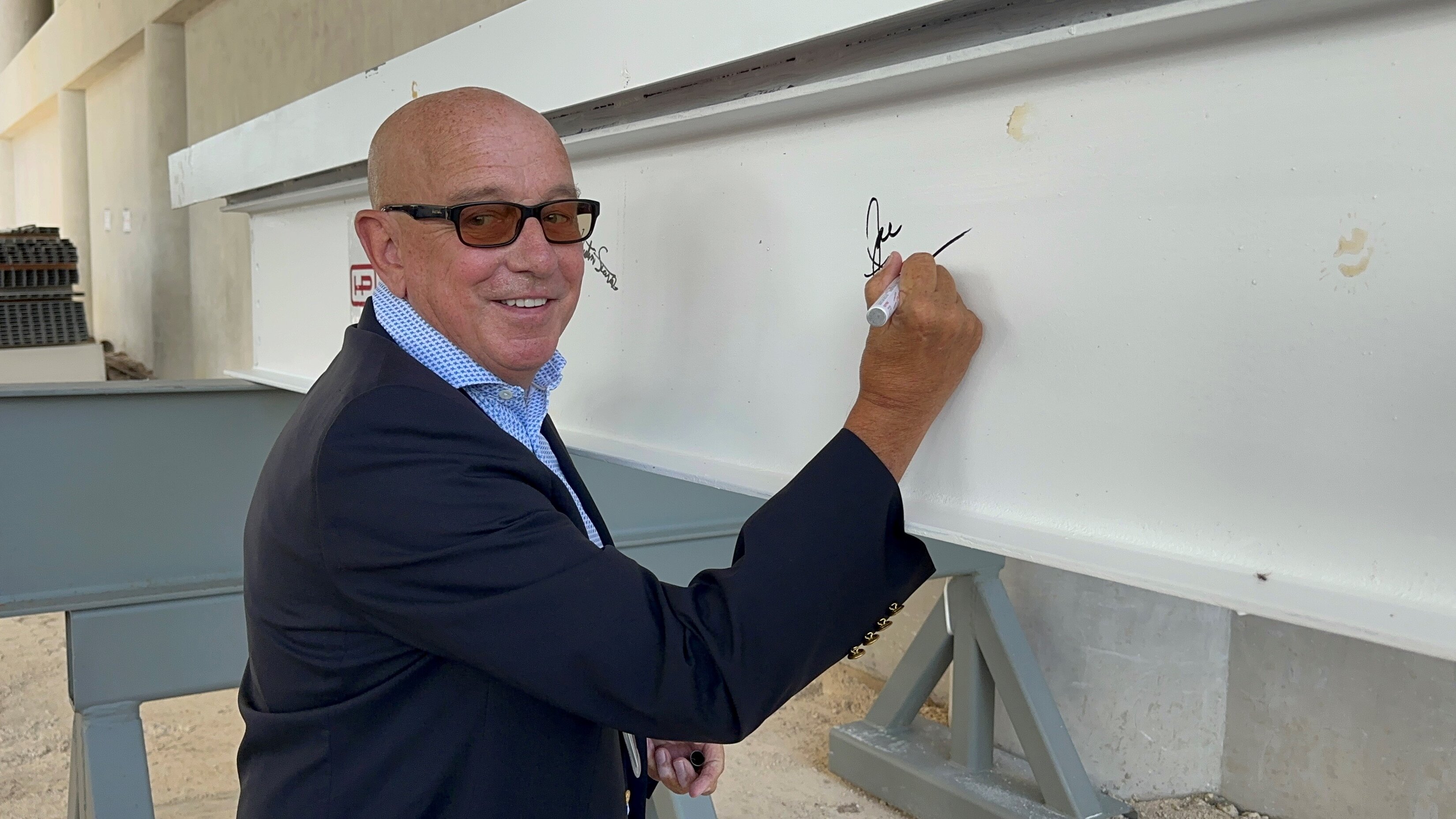 TPA celebrates Red Express Curbsides milestone with 'topping out' event