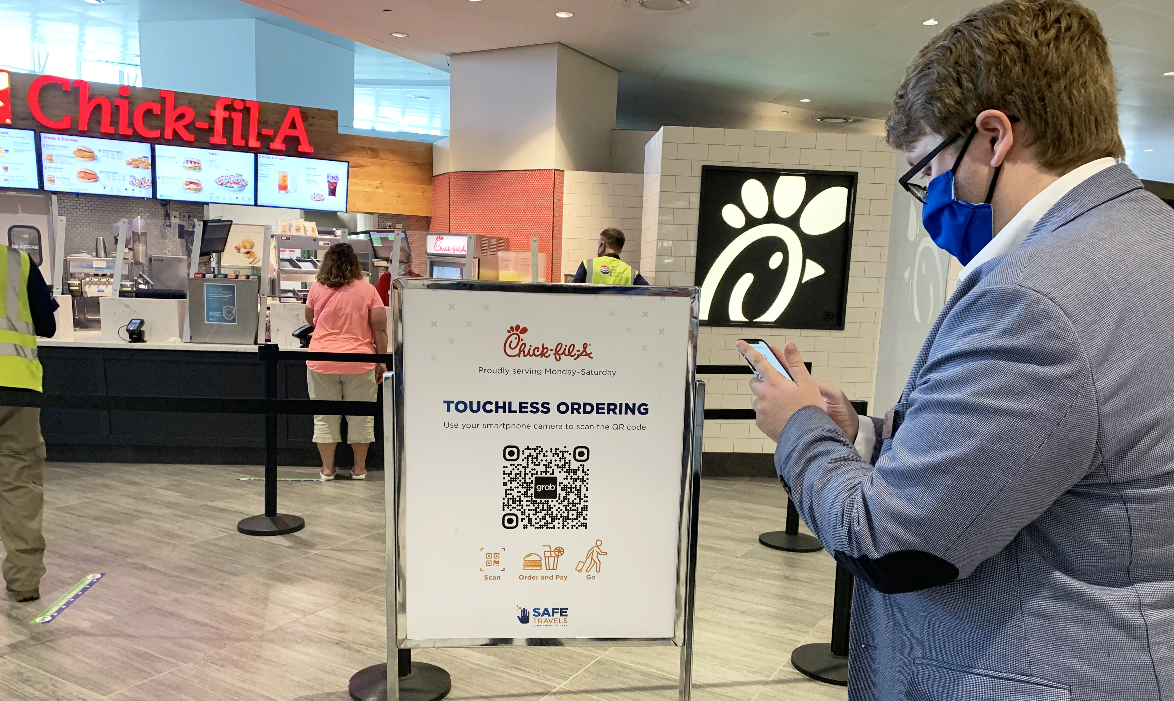 Touchless options expand as 'Grab' is introduced at TPA's busiest ...