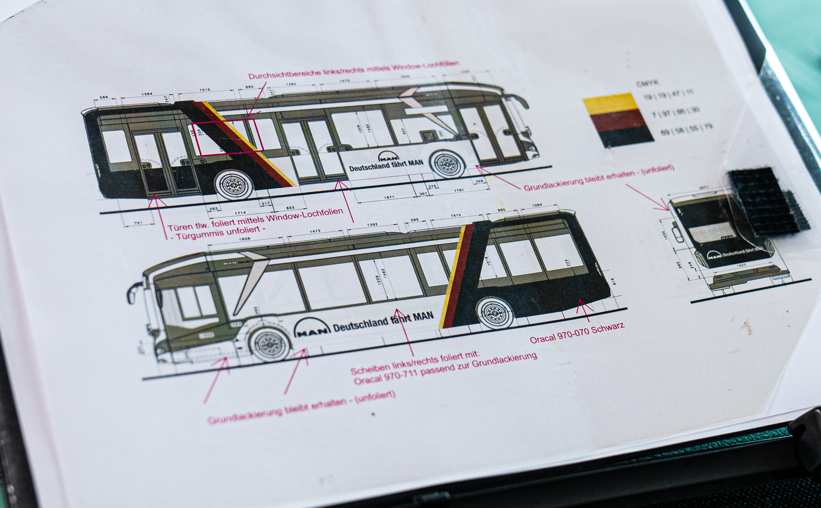 Germany is powered by MAN! Buses featuring a black, red and gold design ...