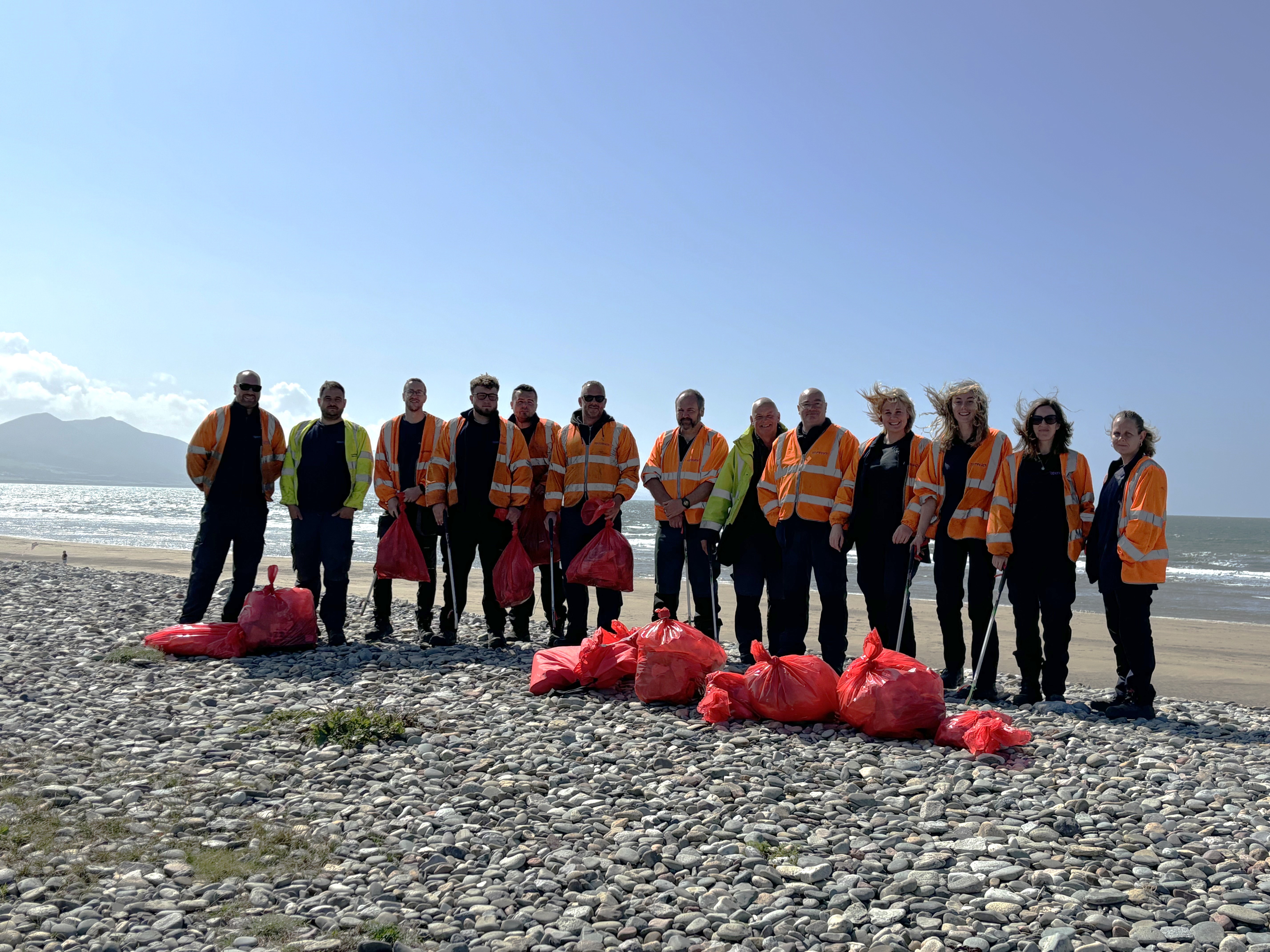 Openreach volunteers sweep up at Dinas Dinlle clean up