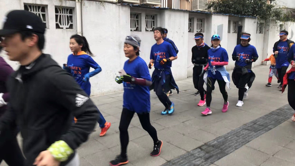 Running for passion, running for good: NUS Business sets new record ...